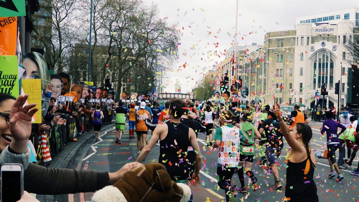 As runners gear up for the Tata Mumbai Marathon, spectators line up ...